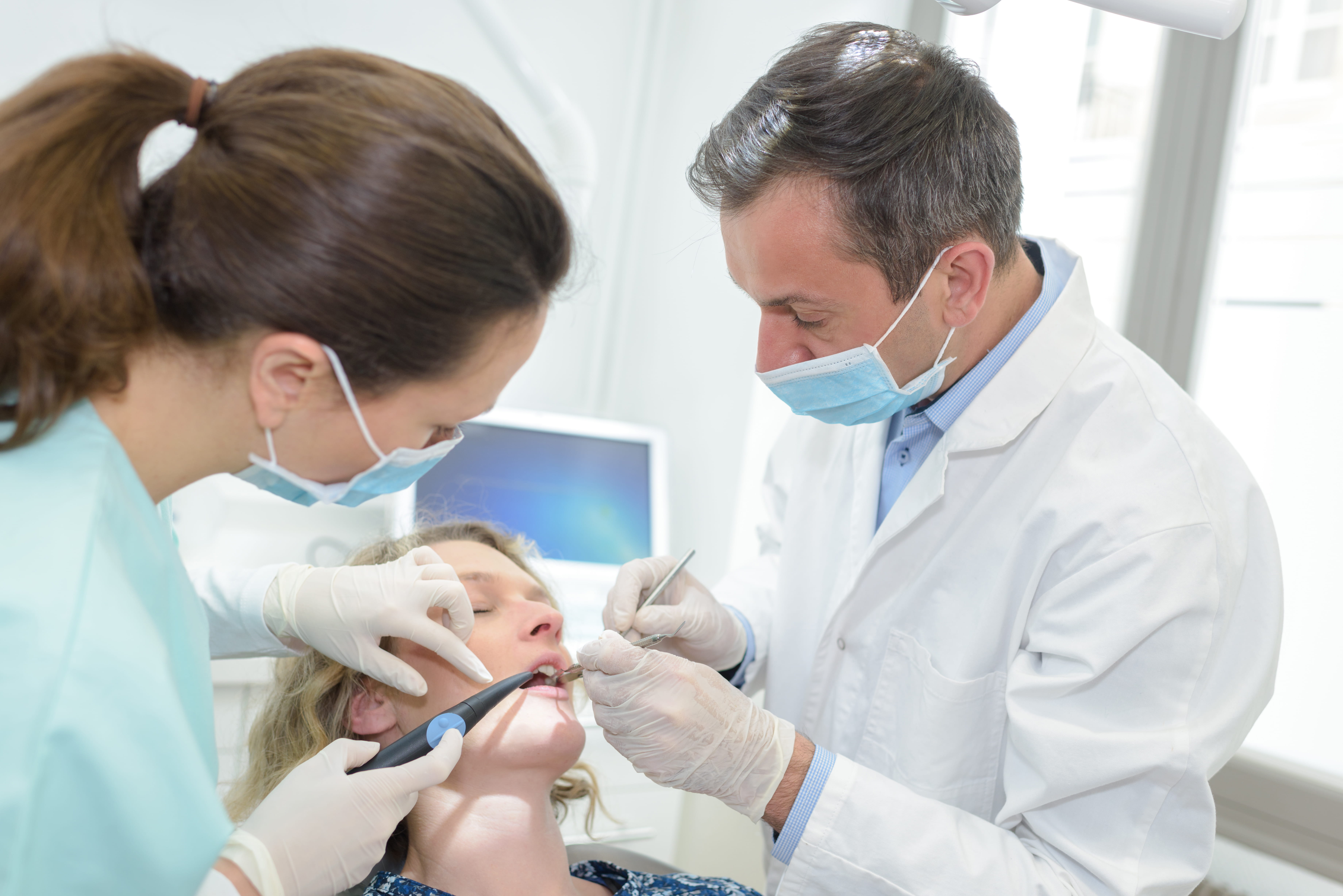 UBK with a DEM for Extraction of Mandibular Middle & Low Impacted Teeth